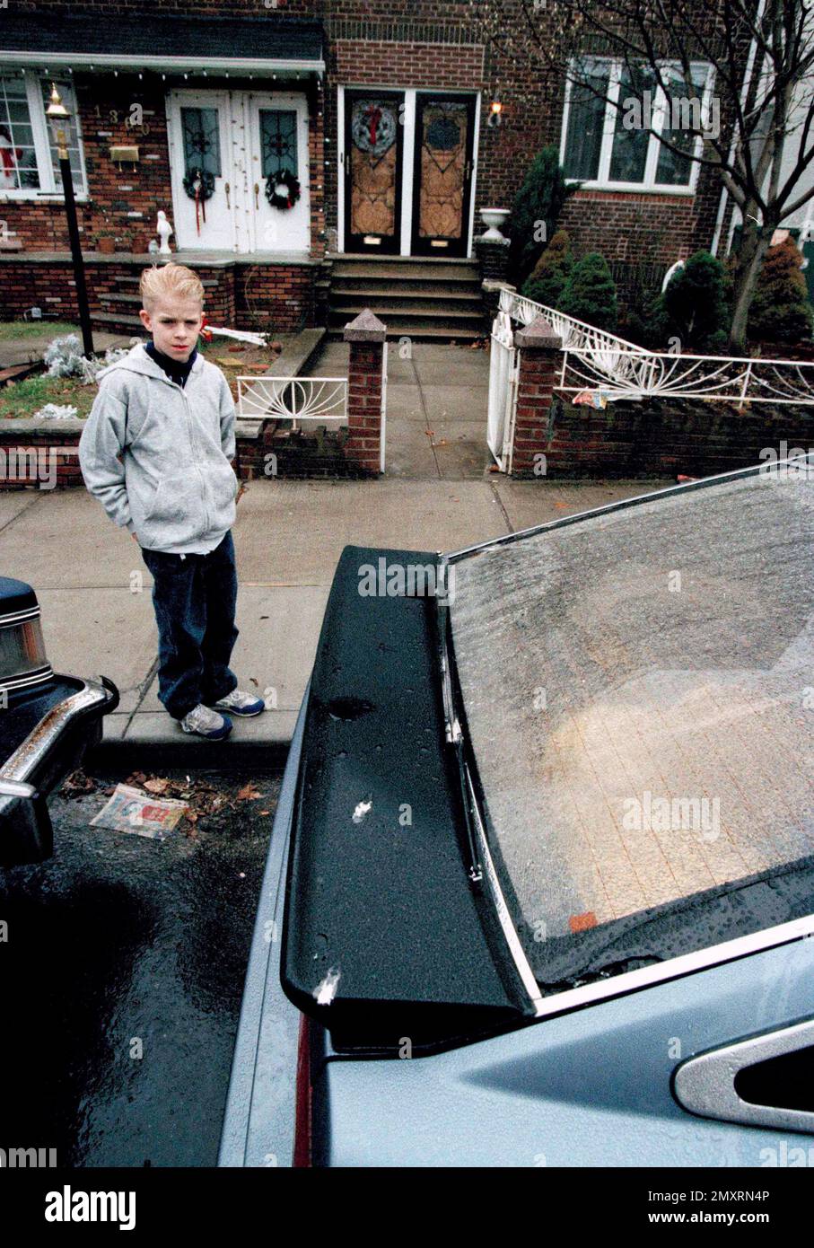 A neighborhood youngster, Raymond Rollin, 12, checks out the white ...