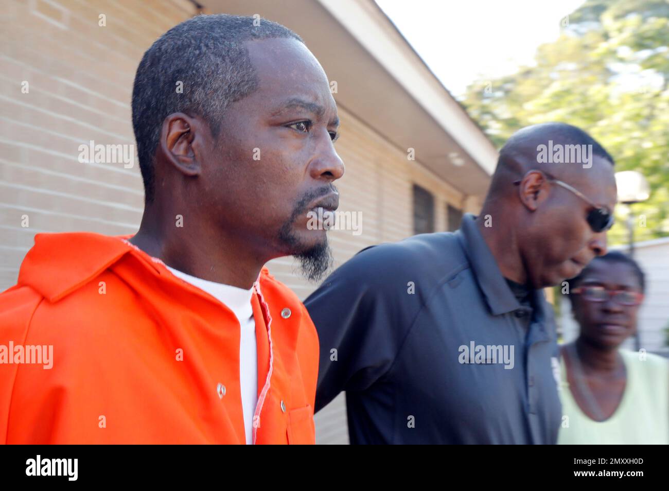 Rodney Earl Sanders, of Kosciusko, Miss., says nothing as leaves the ...