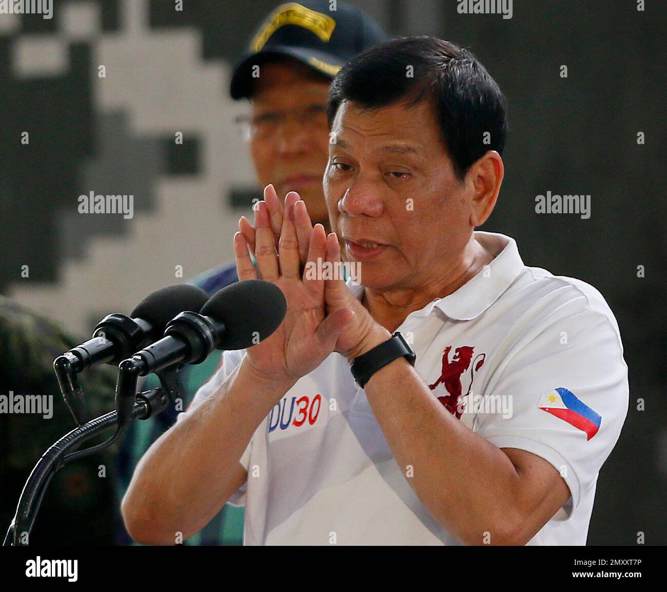 Philippine President Rodrigo Duterte gestures while addressing the ...