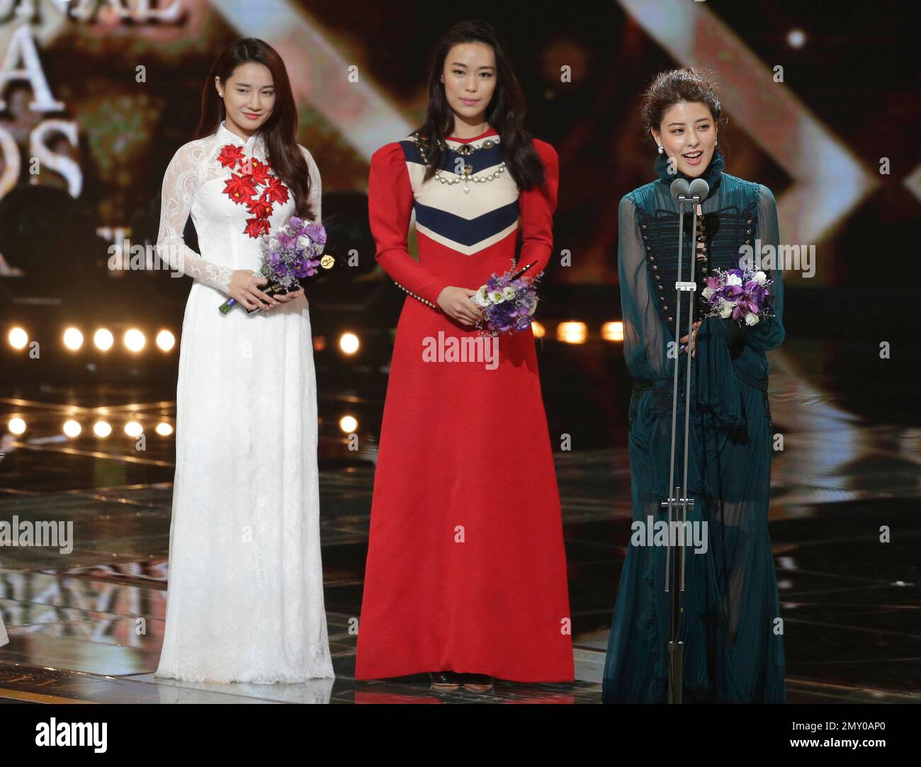 Japanese actress Mina Fujii, right, speaks as Singaporean actress ...