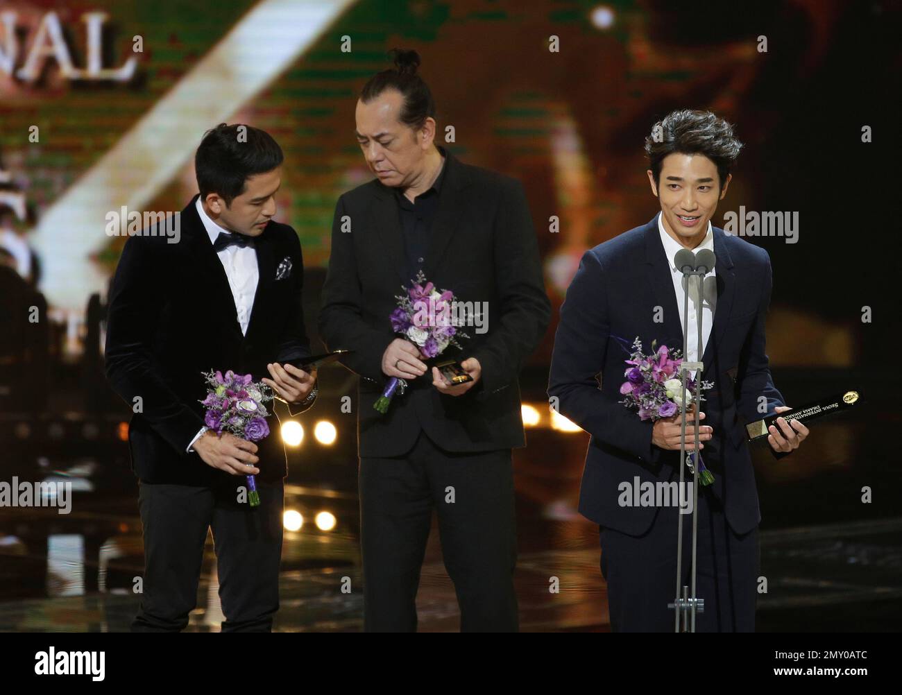 Taiwanese actor actor Liu Yi-Hao, right, speaks as Hong Kong actor ...