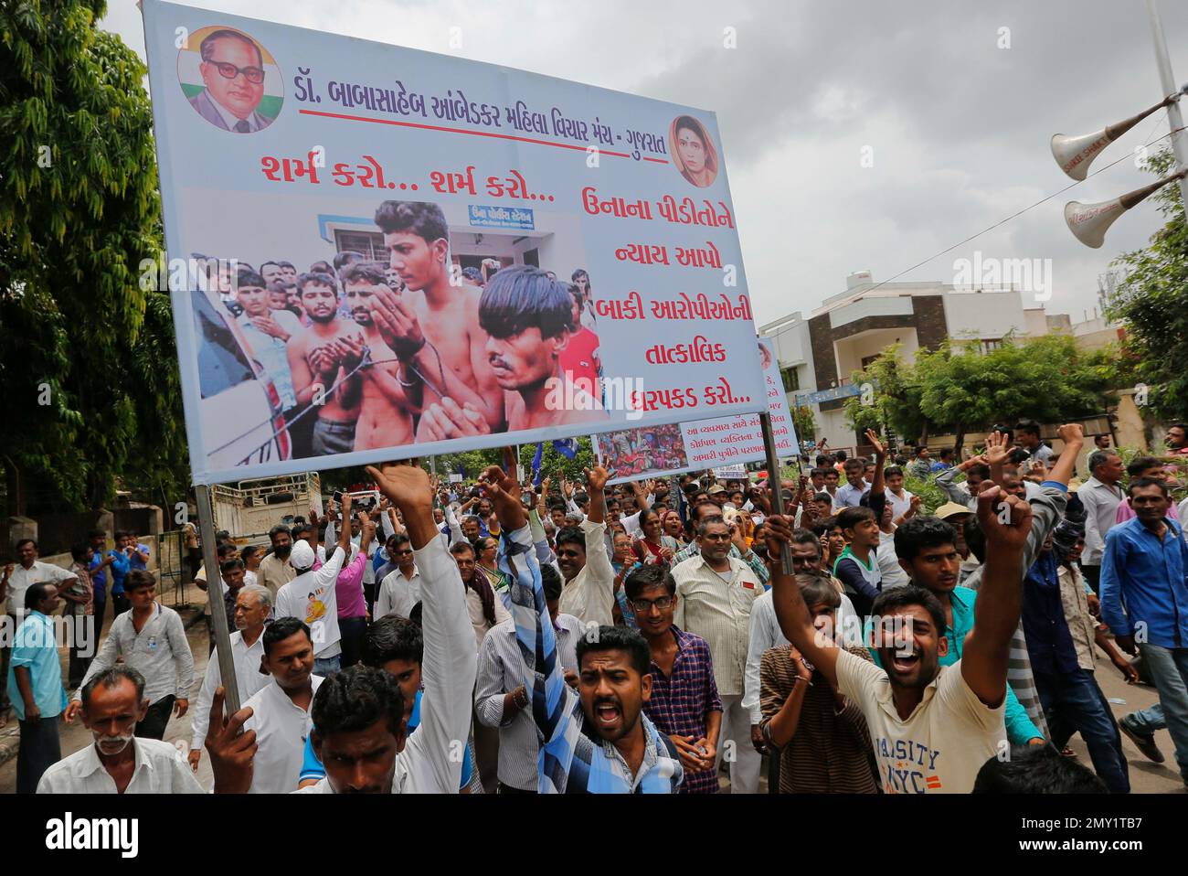 FILE- In this July 31, 2016 file photo, members of India's low-caste ...