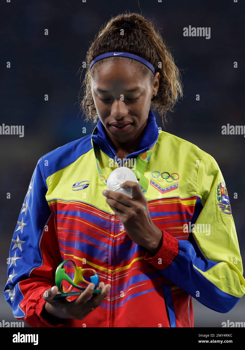 Venezuela's Yulimar Rojas looks at her silver medal during the medal ...