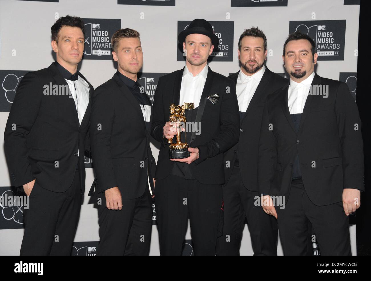 FILE - In this Aug. 25, 2013, file photo, Justin Timberlake, center ...