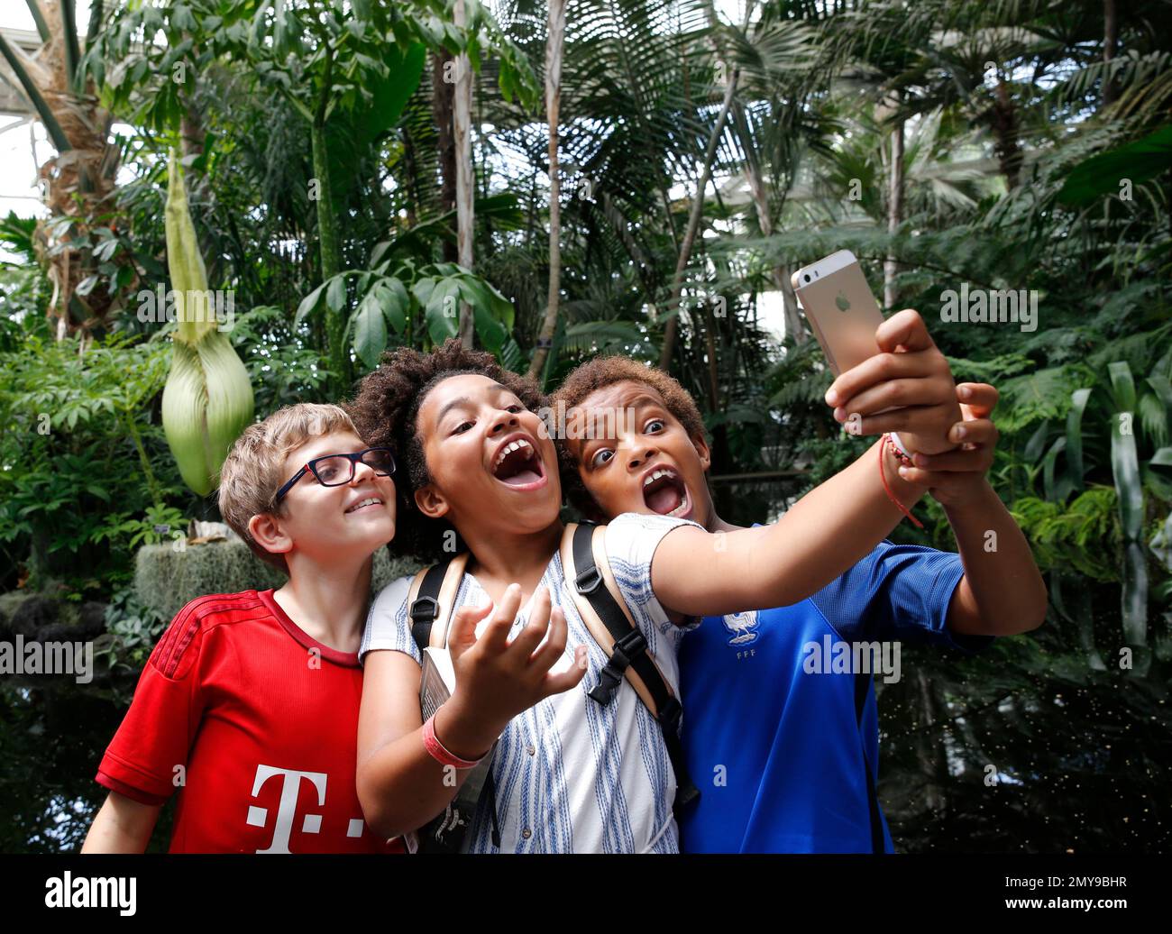 Adam Weissfeklner, 11, Anna Kabwa,12, and her brother Anselm Kabwa, 10 ...
