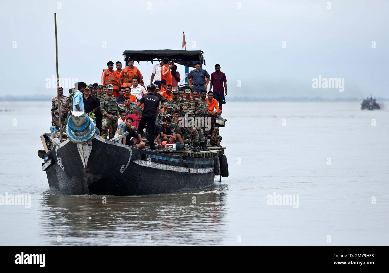 Rescuers and army soldiers arrive to help flood victims at Majuli, a ...