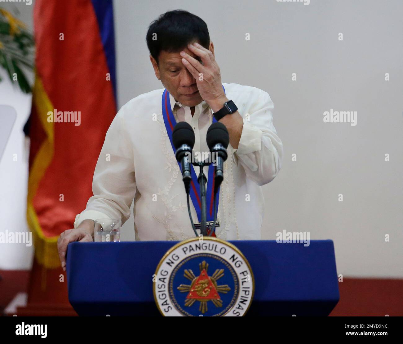 Philippine President Rodrigo Duterte gestures during his speech at the ...