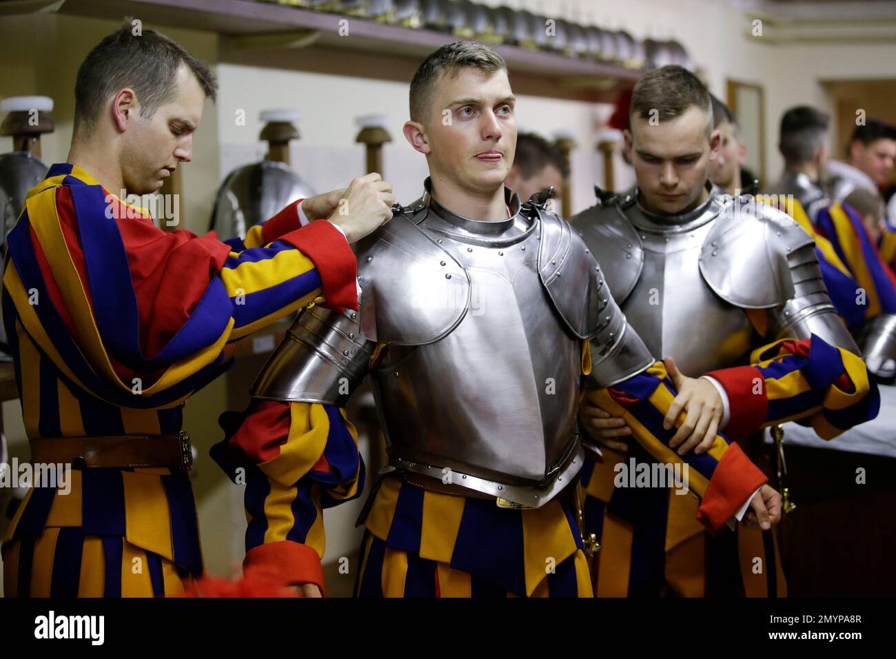New Vatican Swiss Guards wear their uniforms and armors prior to a ...