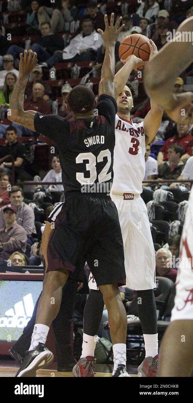 Alabama forward Michael Kessens (3) shoots a 3-point-shot over the ...