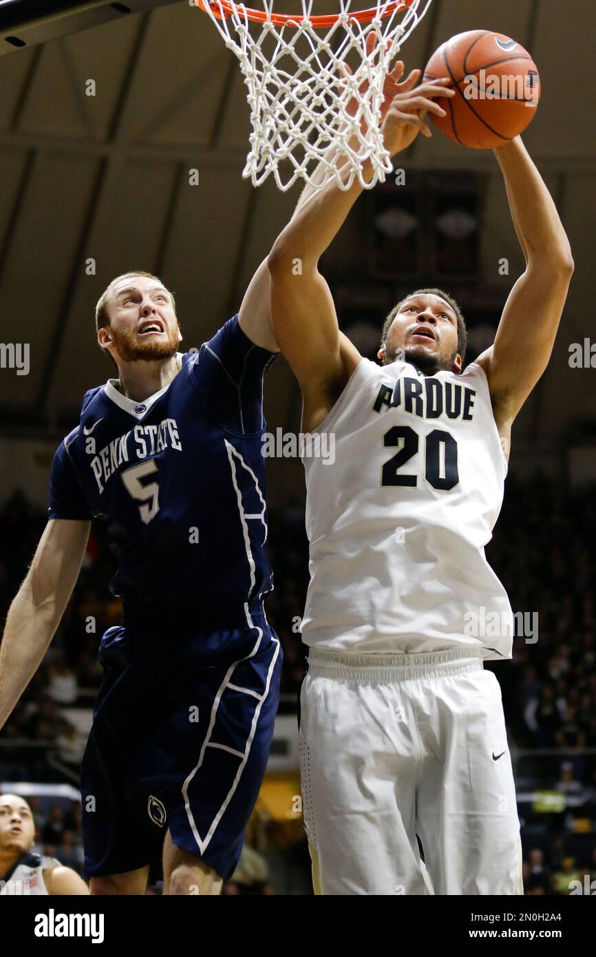 Penn State forward Donovon Jack (5) fouls Purdue center A.J. Hammons ...