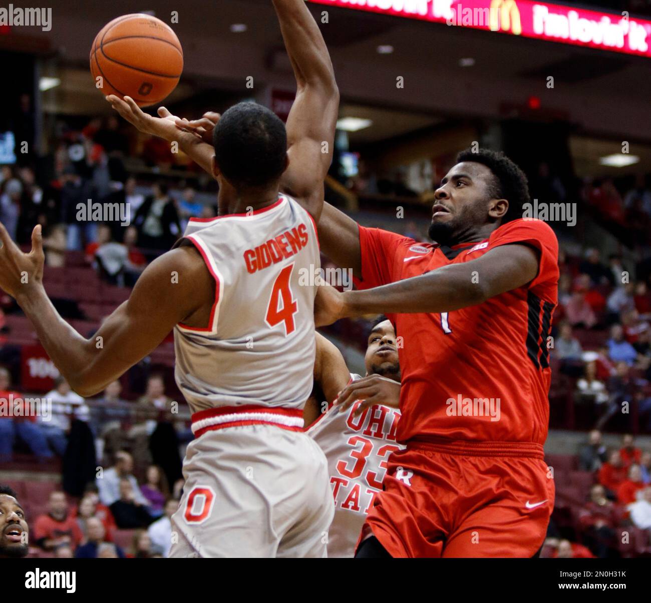 Rutgers' D.J. Foreman, right, shoots against Ohio State's Daniel ...