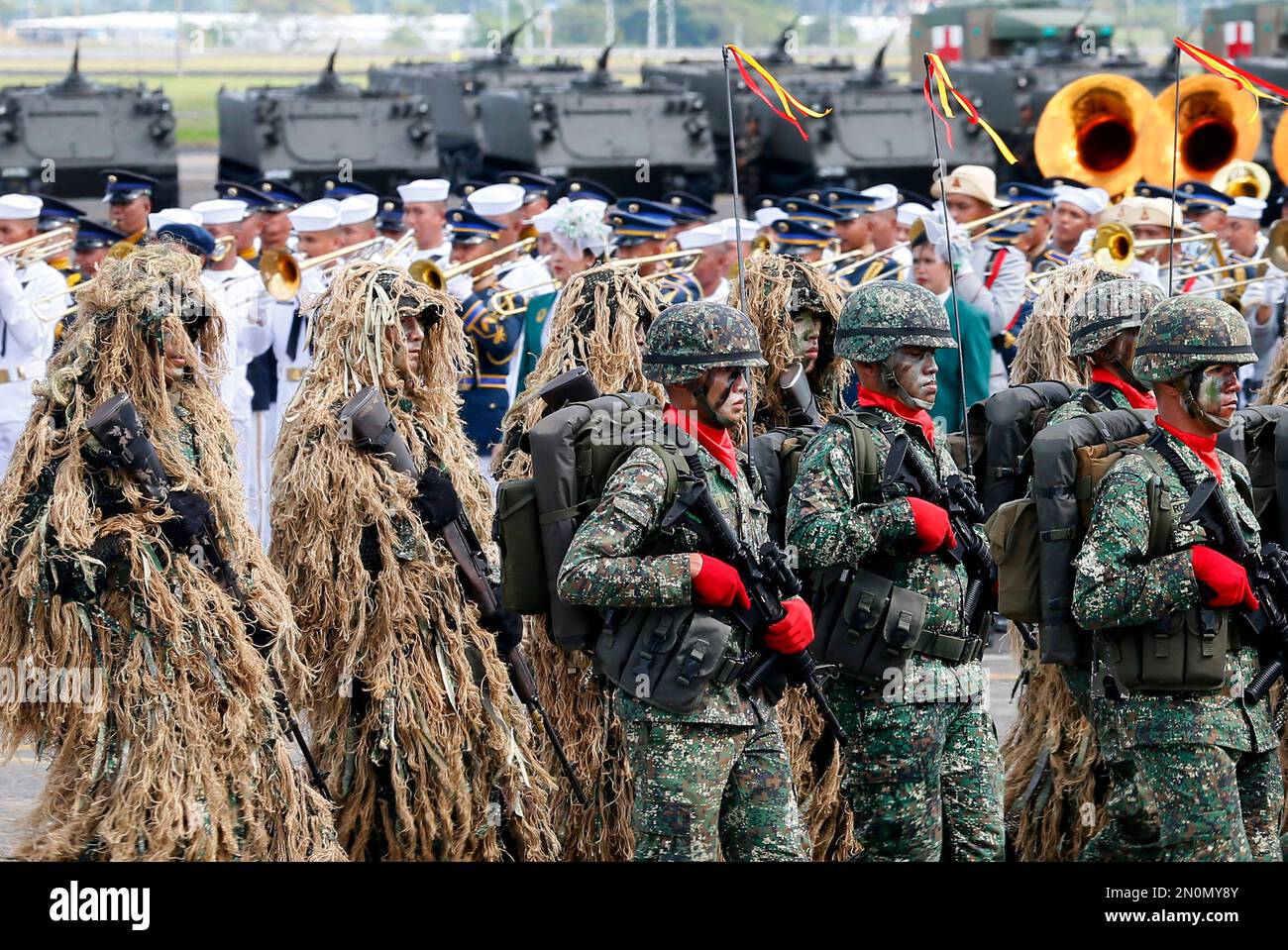 Philippine Special Forces march past the grandstand during the 80th ...