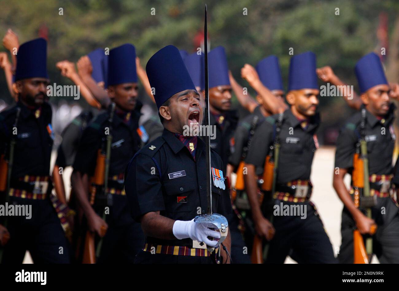 A member of the Indian army contingent shouts a commad to fellow ...