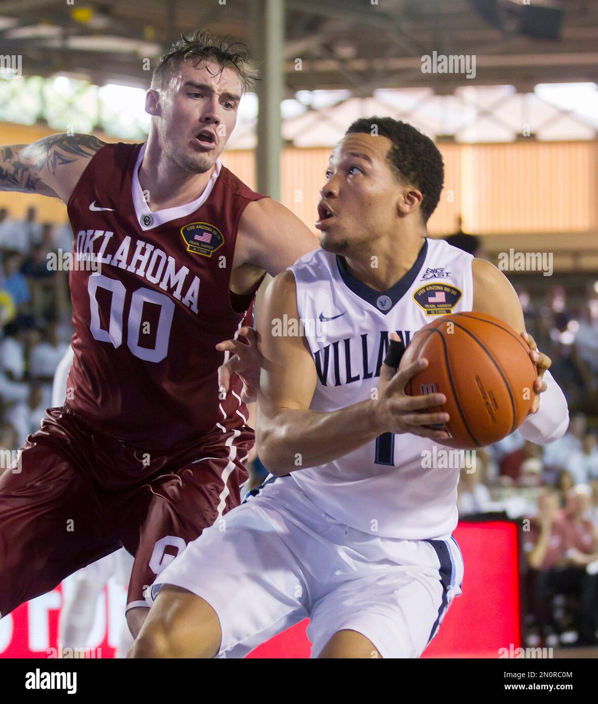 Villanova guard Jalen Brunson (1) looks for an open shot while being ...