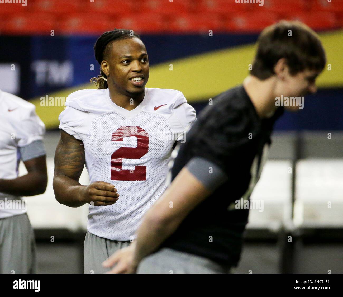 Alabama running back Derrick Henry, left, runs past quarterback Jake ...