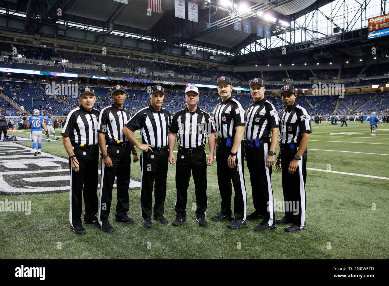 From left, field judge Greg Gautreaux, field judge Jabir Walker, back ...