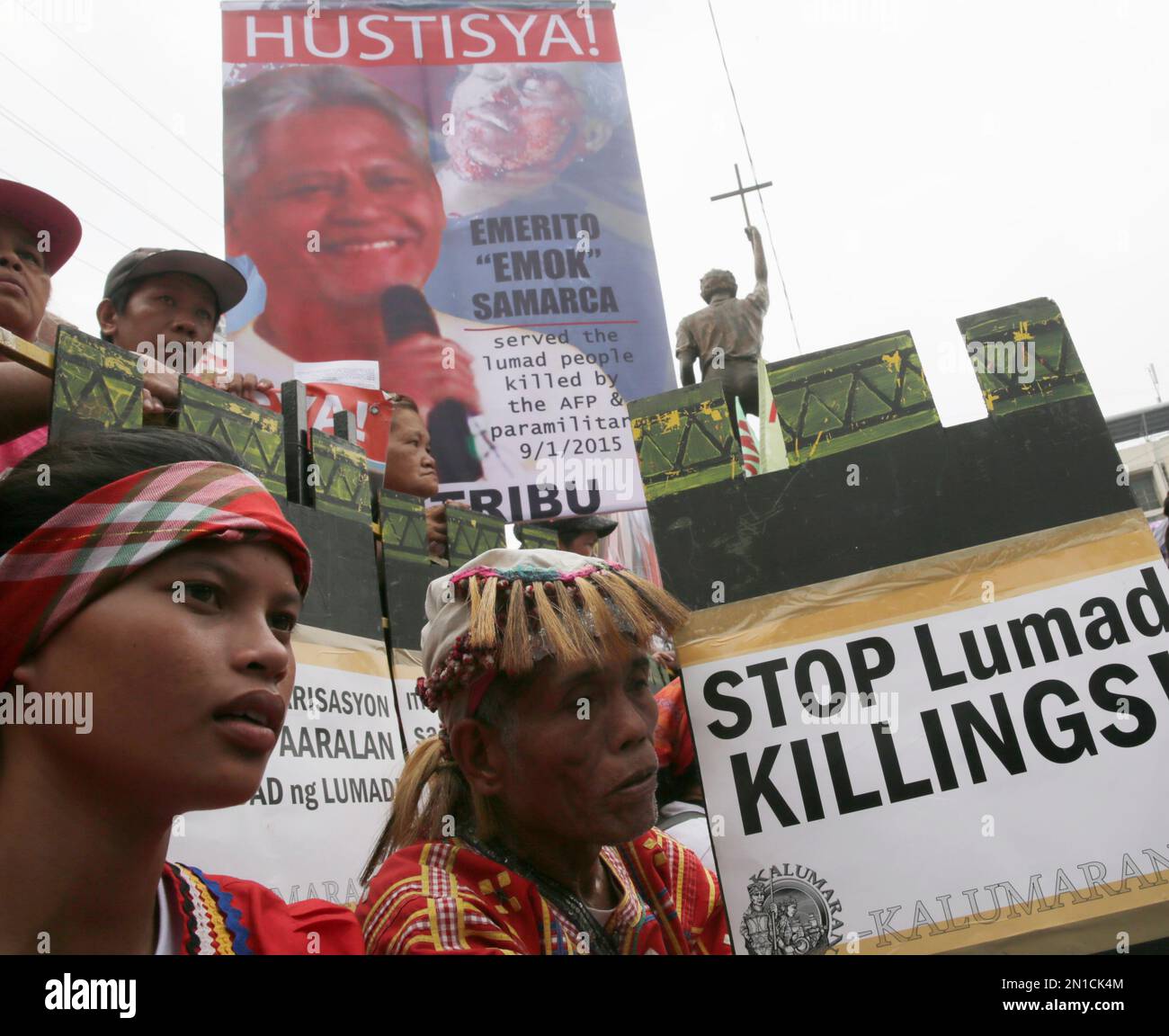 Indigenous peoples known as "Lumads" display their message as they join ...