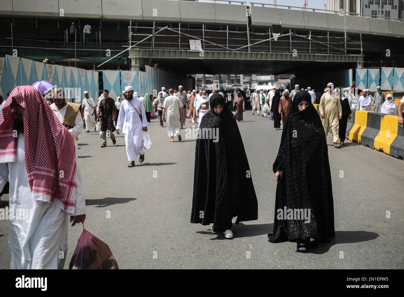 Iranian female pilgrims walk outside the Grand Mosque in the holy city ...