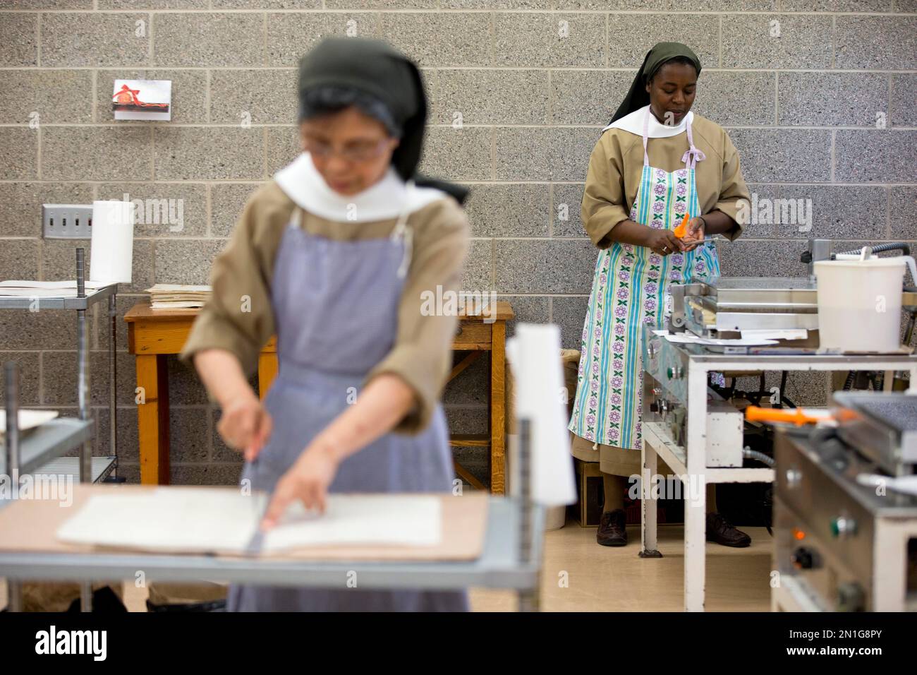 Poor Clares nuns Sister Holy Spirit, right, and Sister Isabel make ...