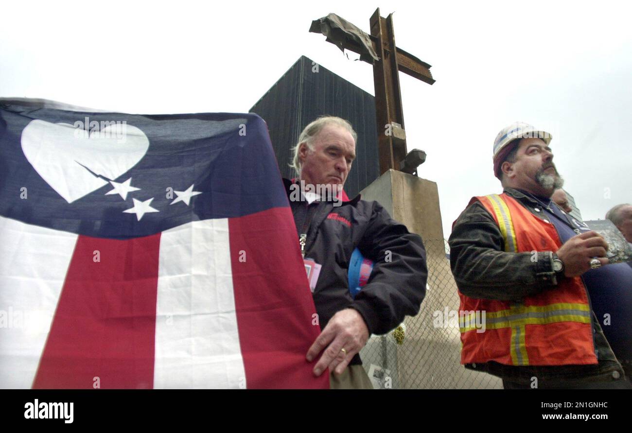 FILE - In this Oct. 4, 2002, file photo, construction workers Terence ...