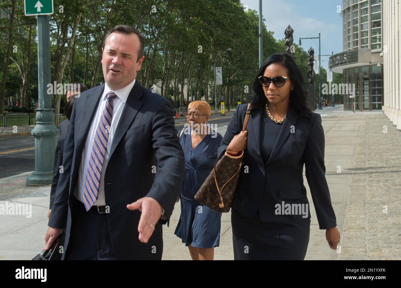 Defense attorney Edward O'Callaghan and Kendra Gamble-Webb leave the ...