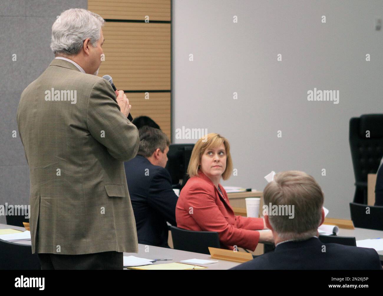 State Sen. Mia Costello, R-Anchorage, listens as Sen. Pete Kelly R ...