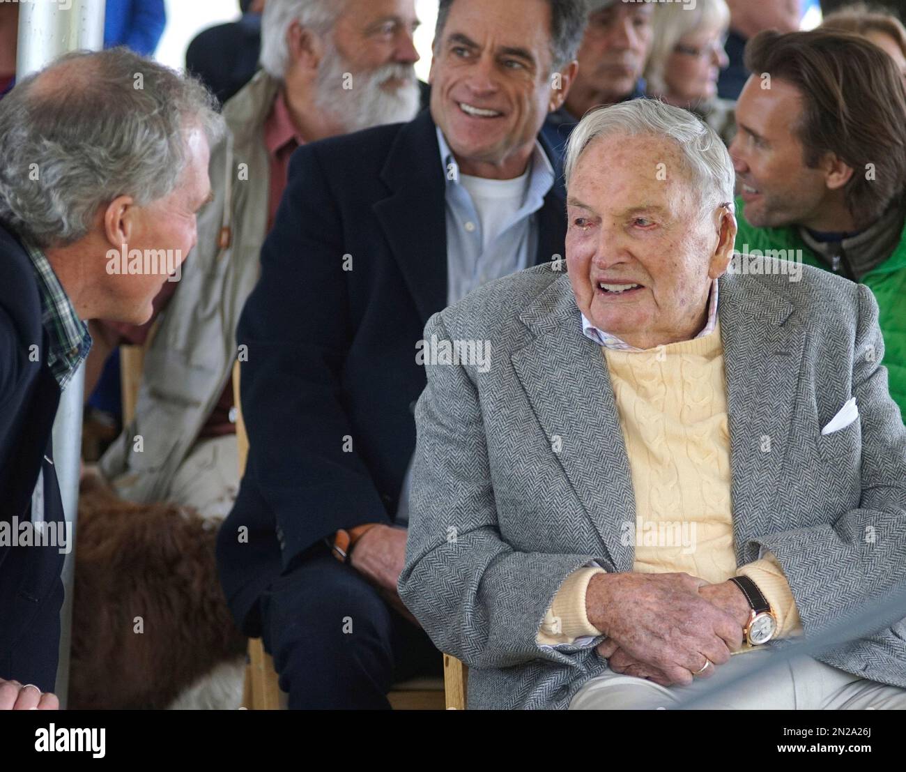 David Rockefeller, right, greets family and friends at a ceremony ...