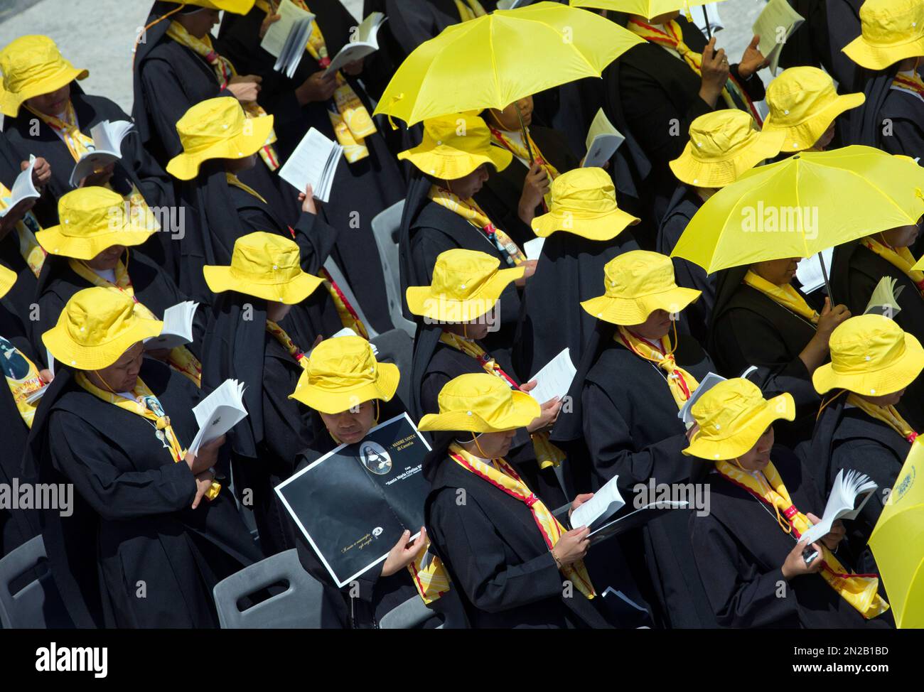 Nuns attend the canonization ceremony of four new saints led by Pope ...