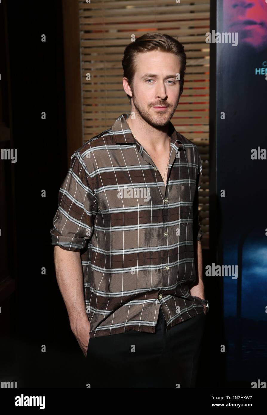 Canadian actor Ryan Gosling poses for photographers, after making his ...
