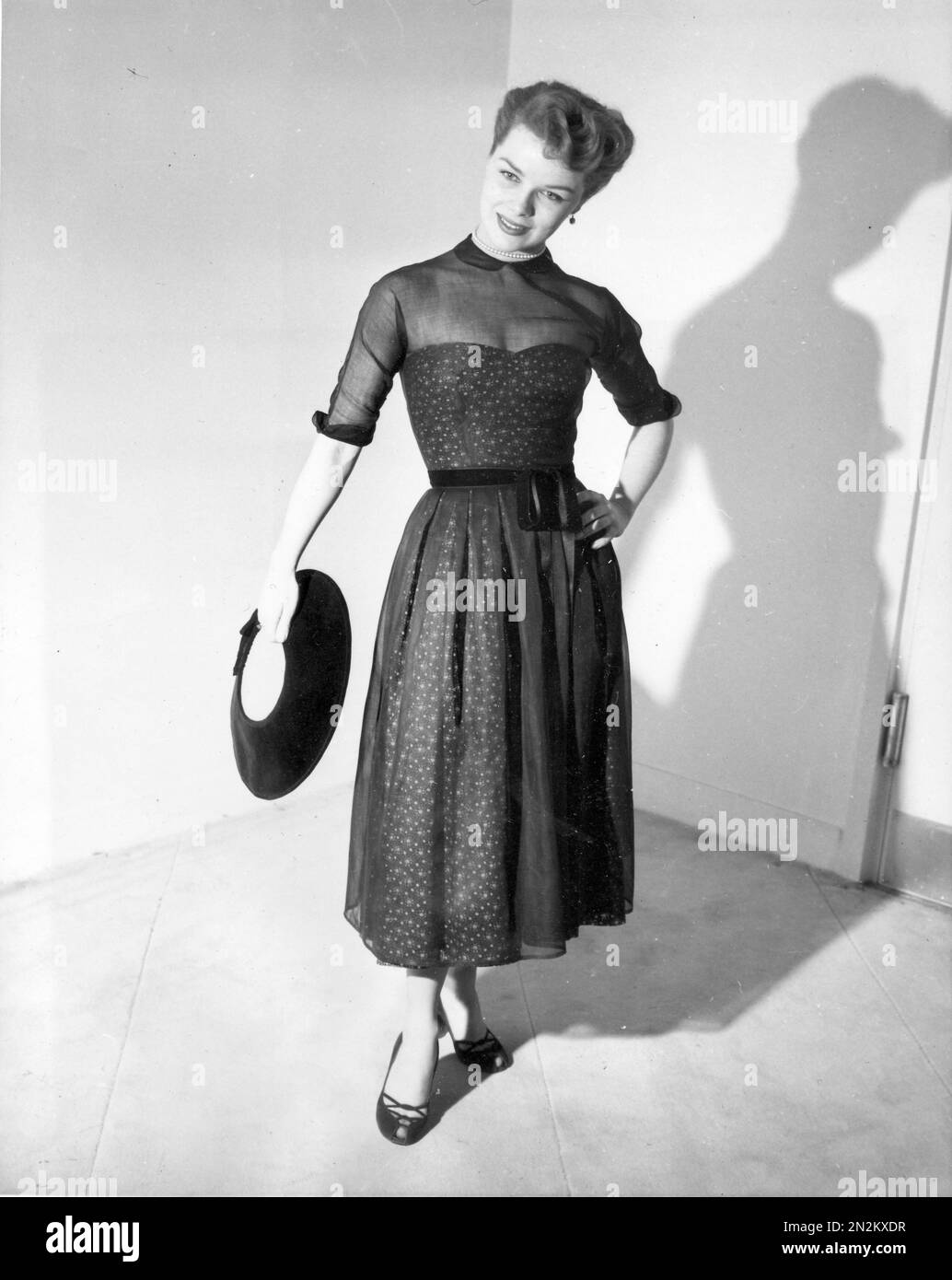 FILE - This March 5, 1950 file photo shows Sally Forrest modeling a ...