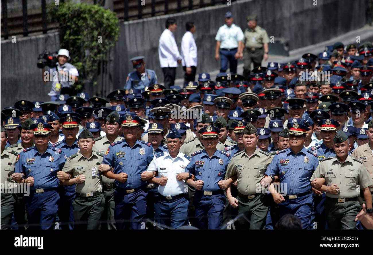 Members of the Philippine police and Armed Forces of the Philippines ...