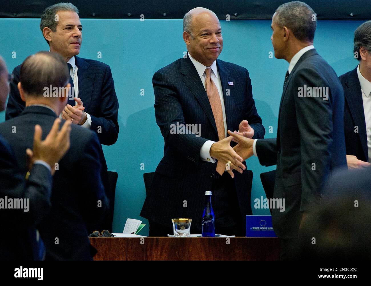 President Barack Obama shakes hands with Homeland Security Secretary ...