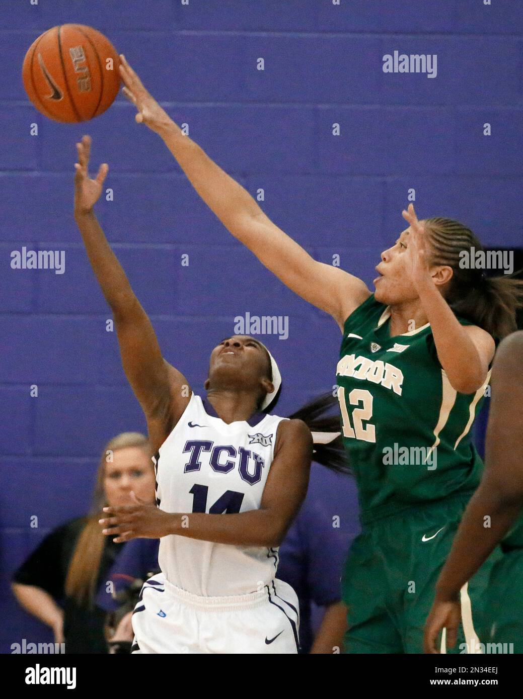 TCU guard Zahna Medley (14) has her shot blocked by Baylor's Alexis ...
