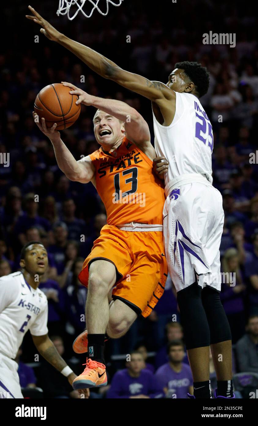 Oklahoma State guard Phil Forte III (13) is fouled by Kansas State ...