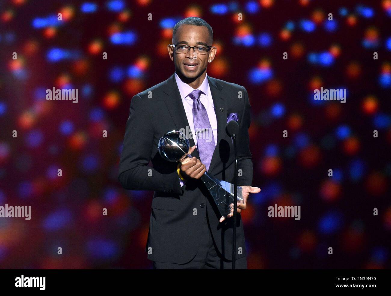 FILE - In a July 16, 2014 file photo, sportscaster Stuart Scott accepts ...