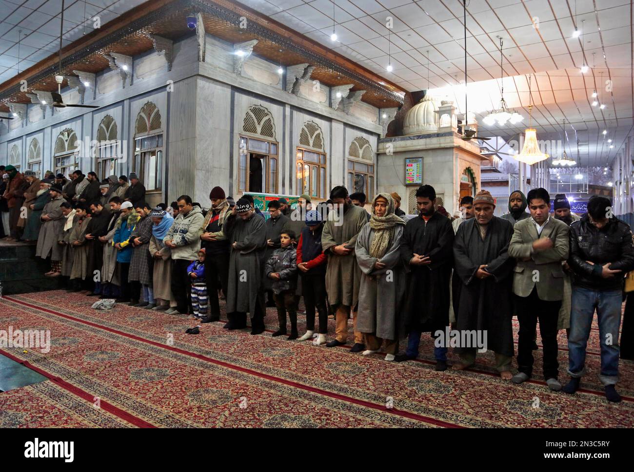 Kashmiri Muslims pray at the shrine of Sufi saint Hazrat Sheikh Hamza ...