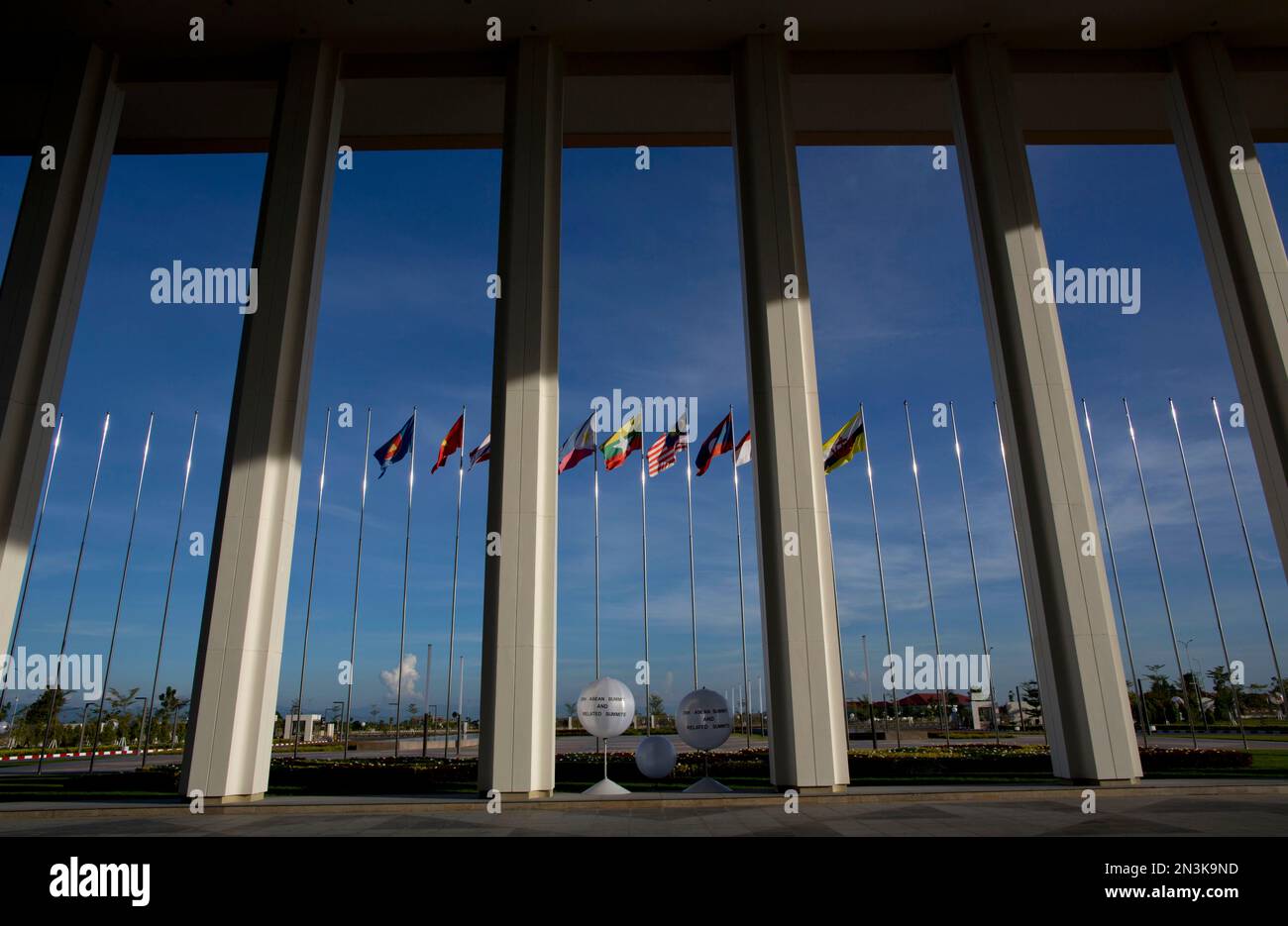 National flags of Southeast Asian countries flutter outside the facade ...