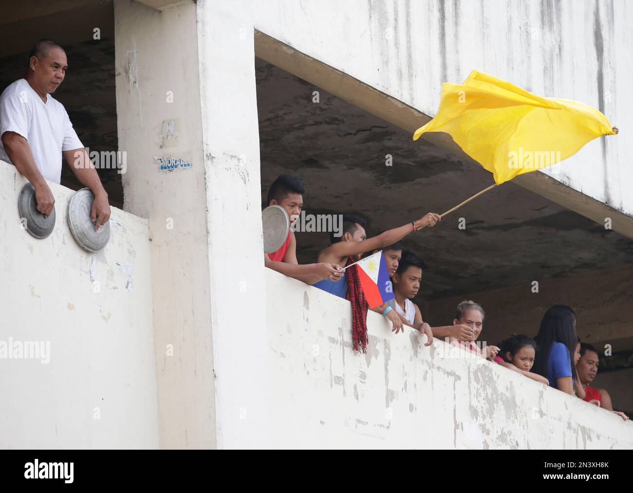 Residents bang pots and pans as they stage a "noise barrage" to protest ...