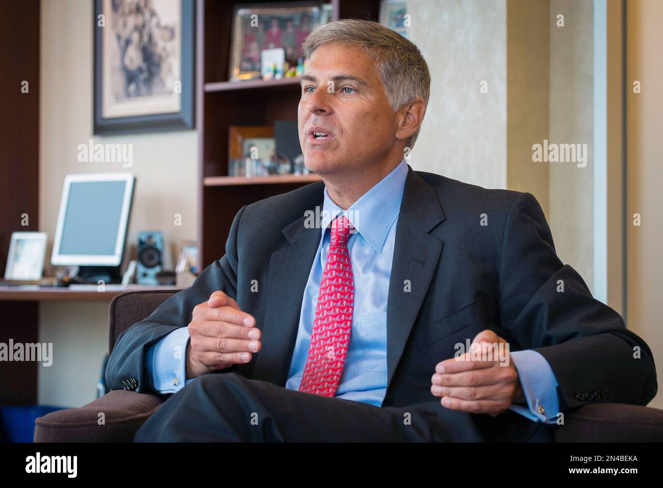 In this May 29, 2014 photo, Hilton CEO Chris Nassetta answers questions ...