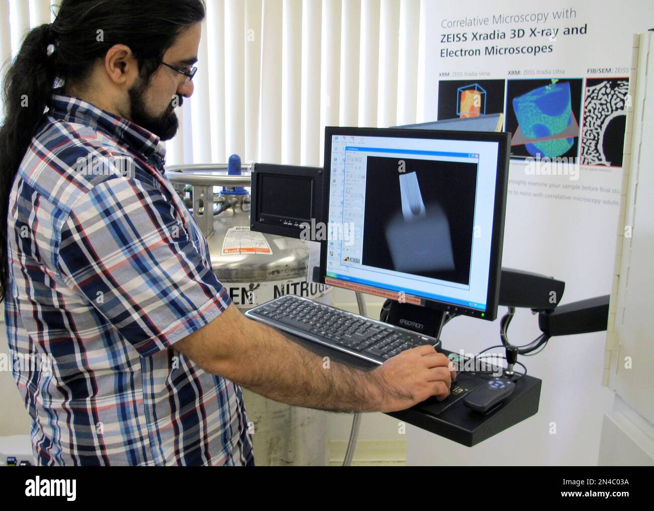 In this July 17, 2014 photo, Sina Shahbazmohamadi, an engineer and the ...