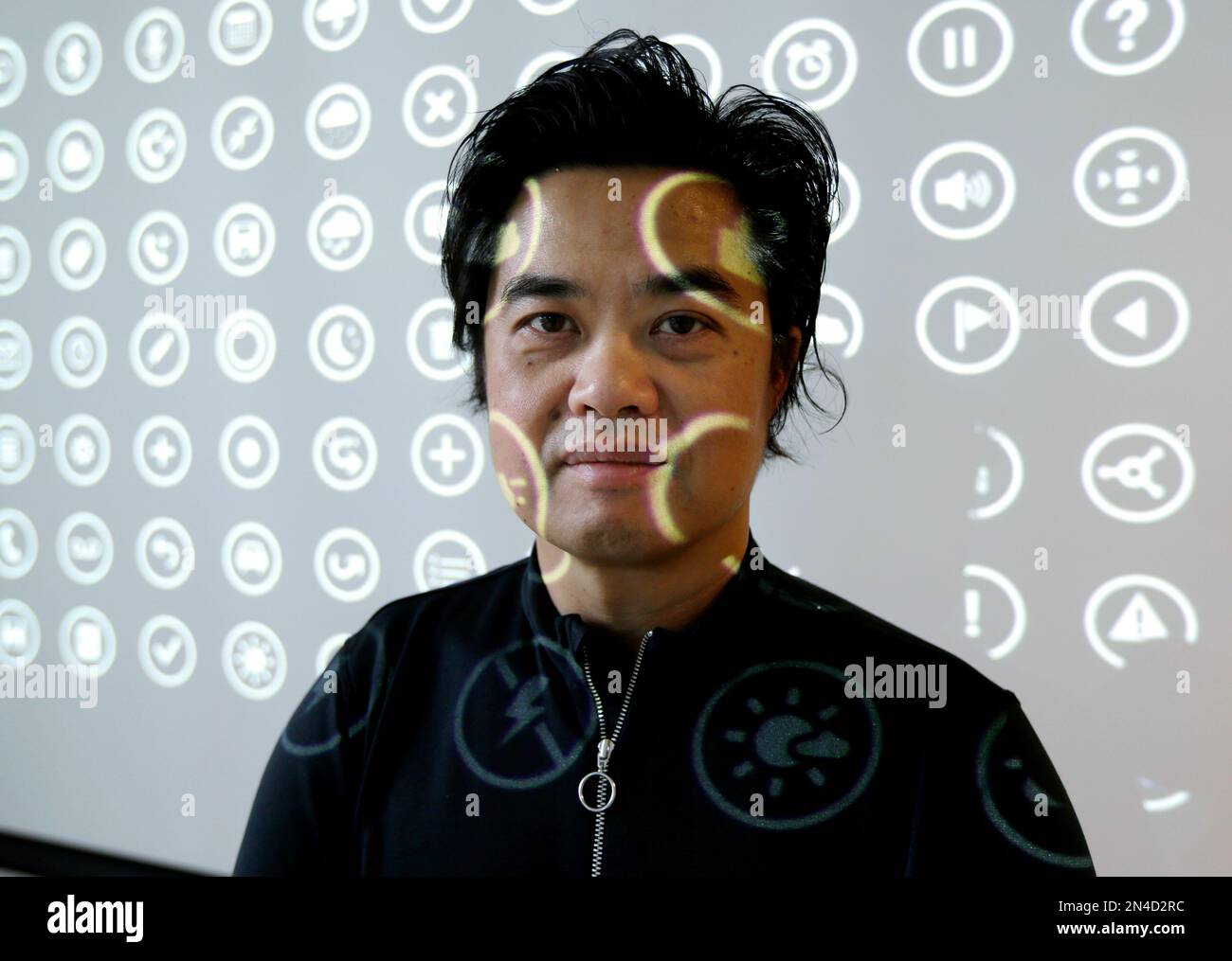 In this photo taken July 3, 2014, Albert Shum, who heads interaction ...