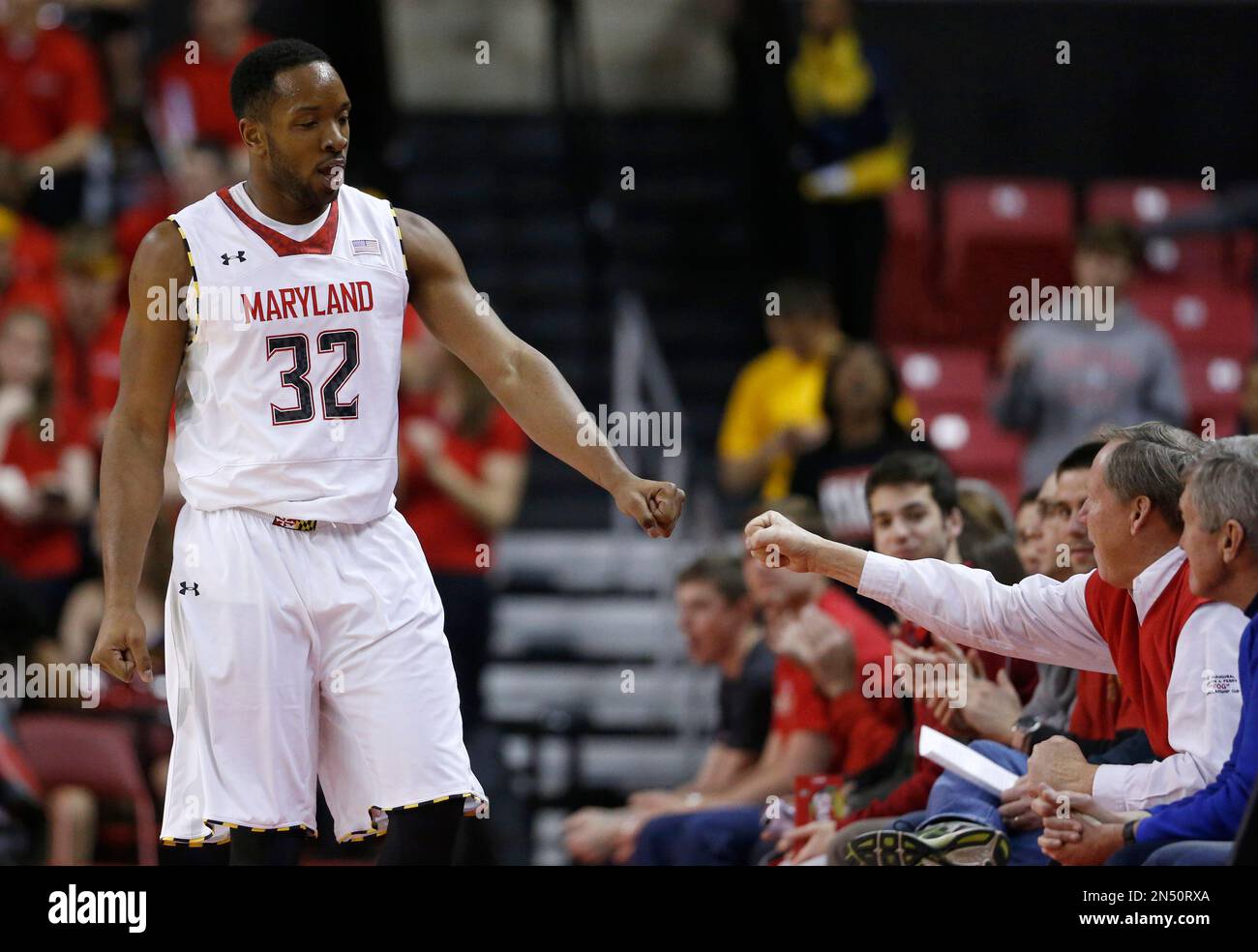FILE- In this March 4, 2014, file photo, Maryland's Dez Wells (32) fist ...