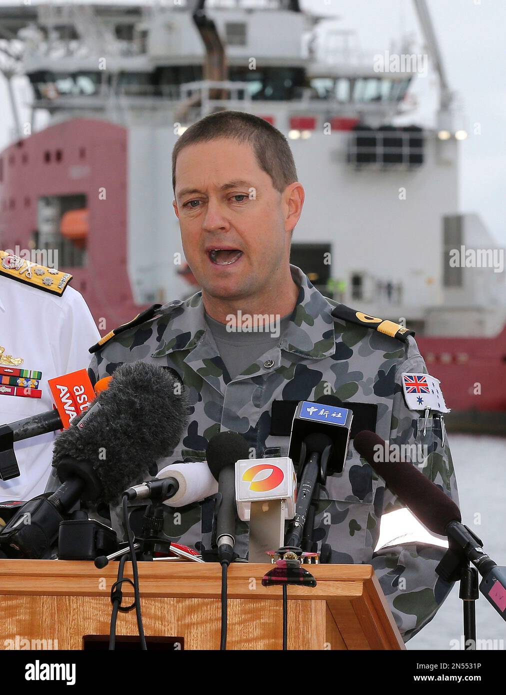 Royal Australian Navy Commodore Peter Leavy speak at a press conference ...