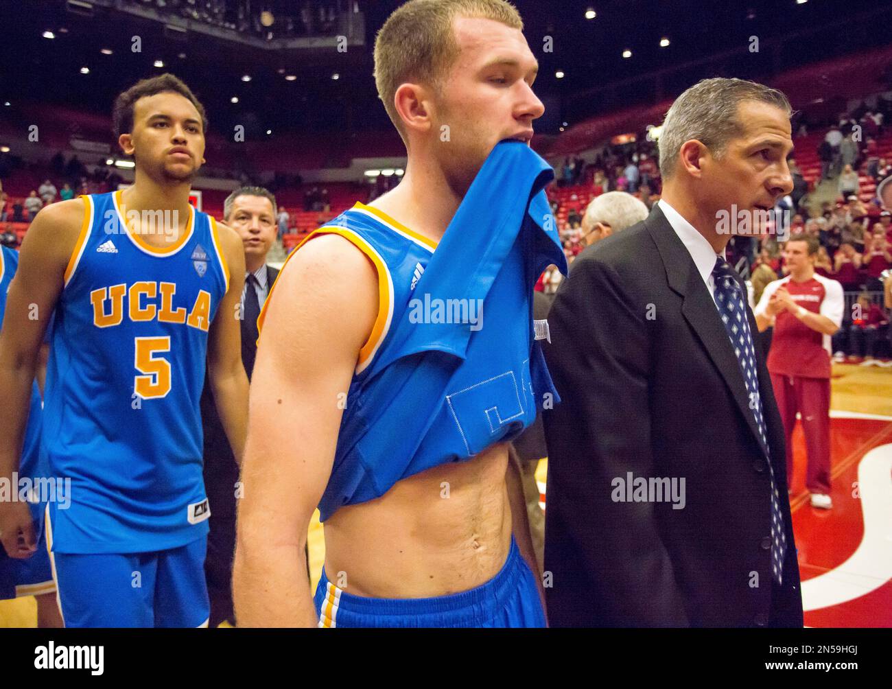 UCLA guard Bryce Alford, center, guard Kyle Anderson (5) and assistant ...
