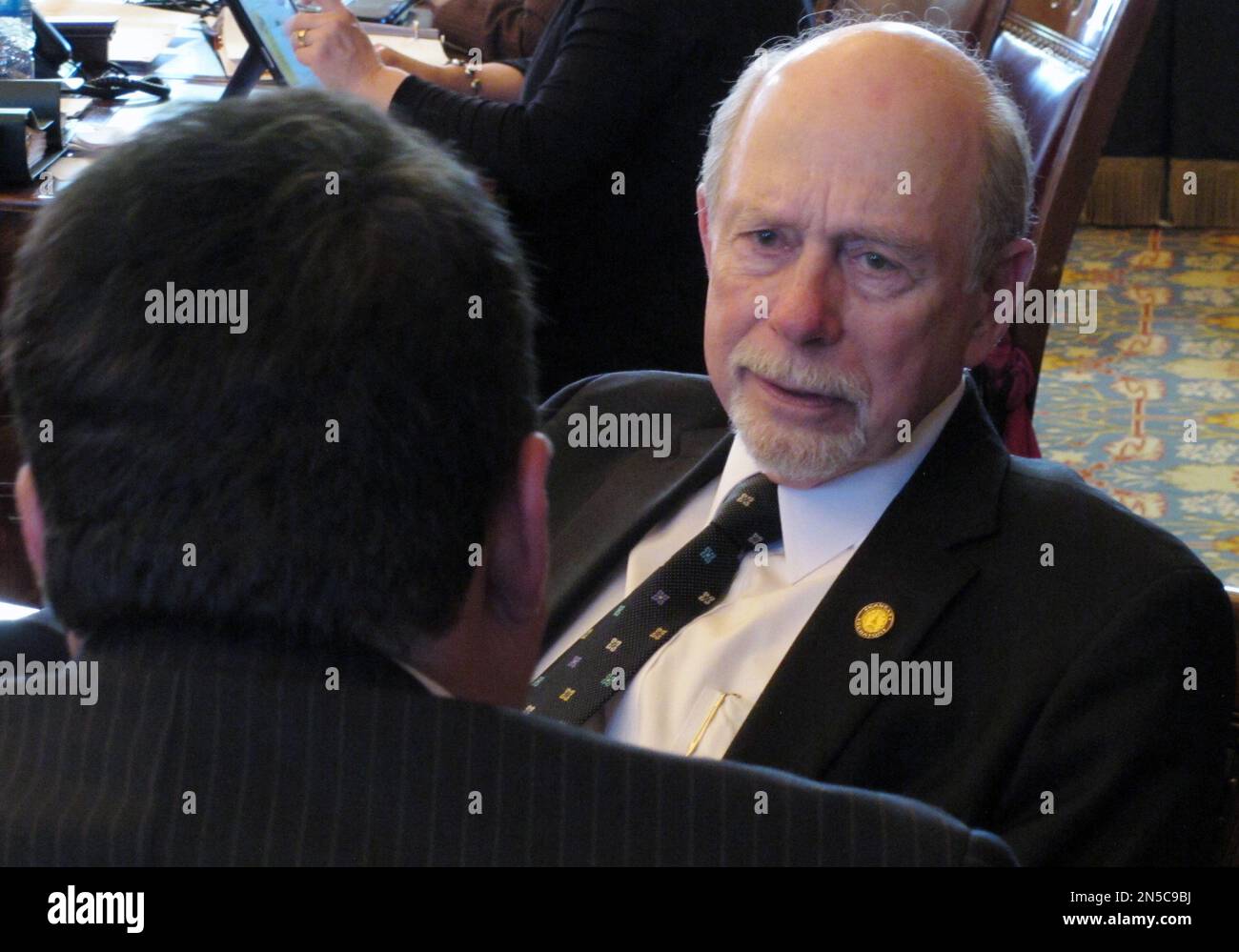Kansas state Sen. Les Donovan, right, a Wichita Republican, talks to ...