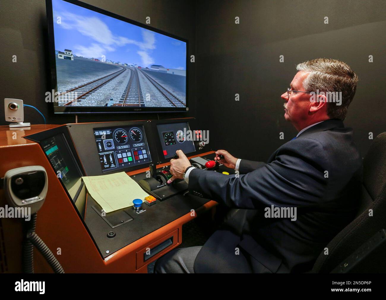 Metrolink Director of Operations, R.T. McCarthy, demonstrates Metrolink ...