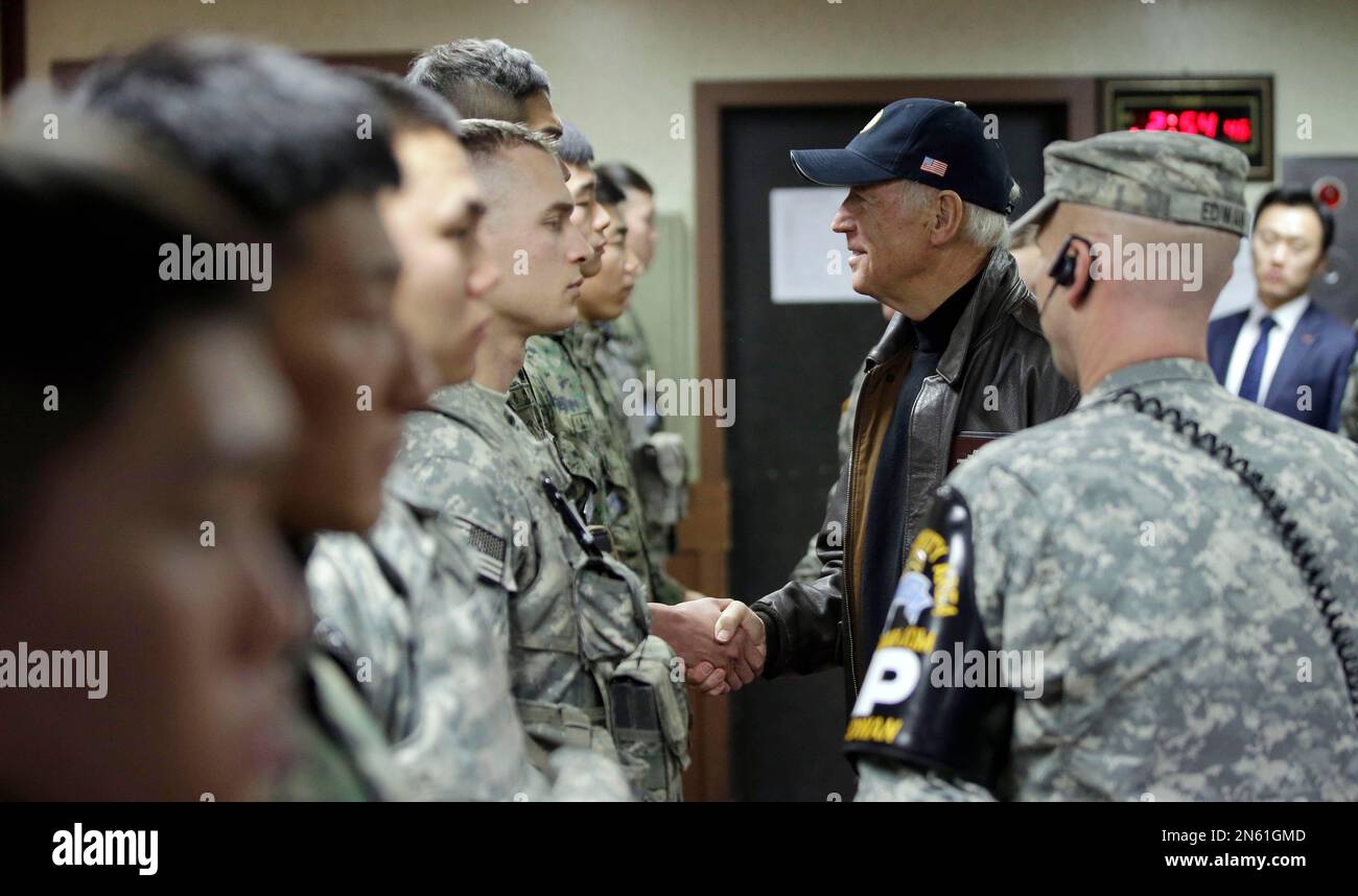 U.S. Vice President Joe Biden, center right, shakes hands with South ...