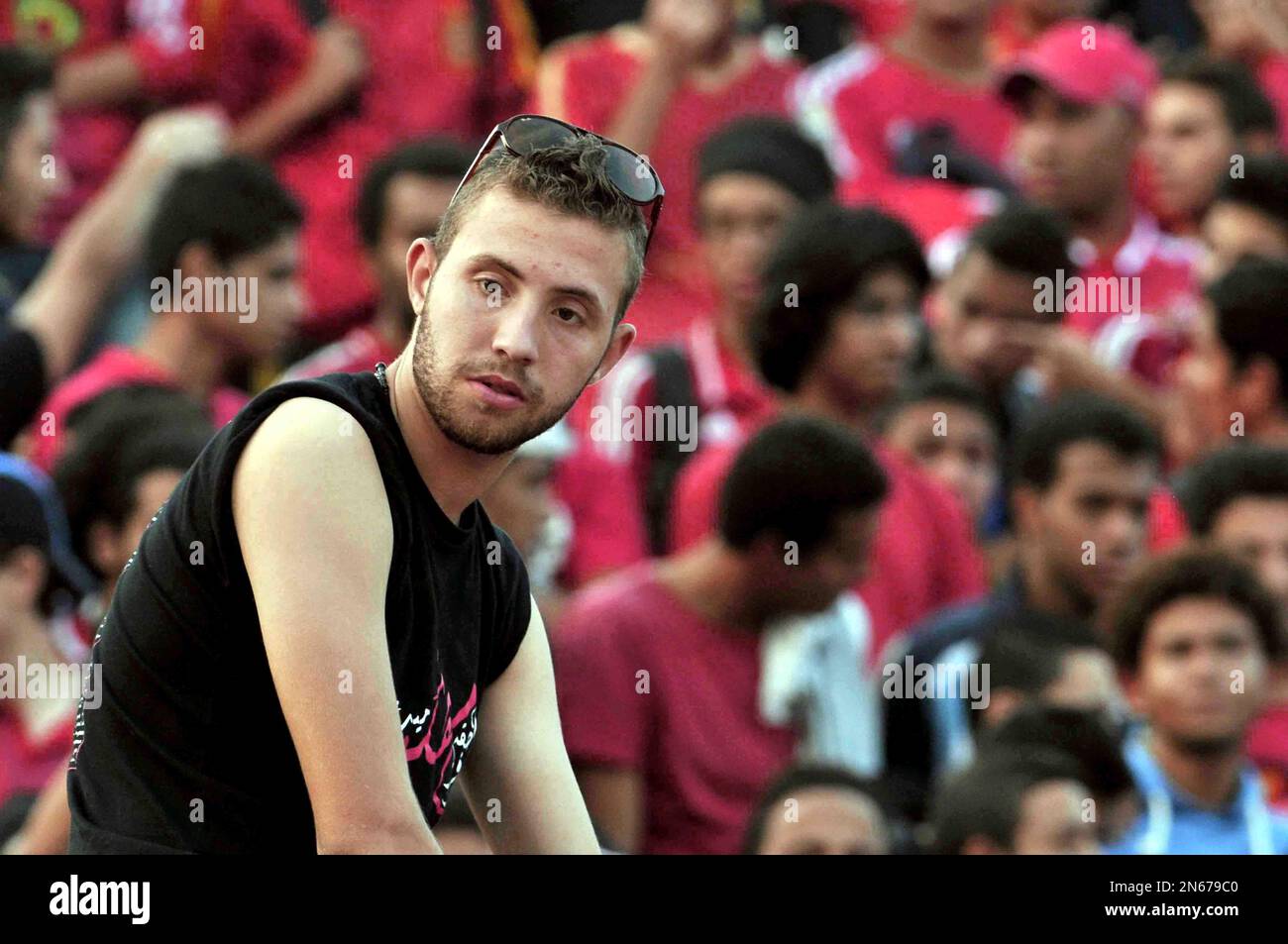 An Egyptian club Al Ahly fan watches the African Champions League ...