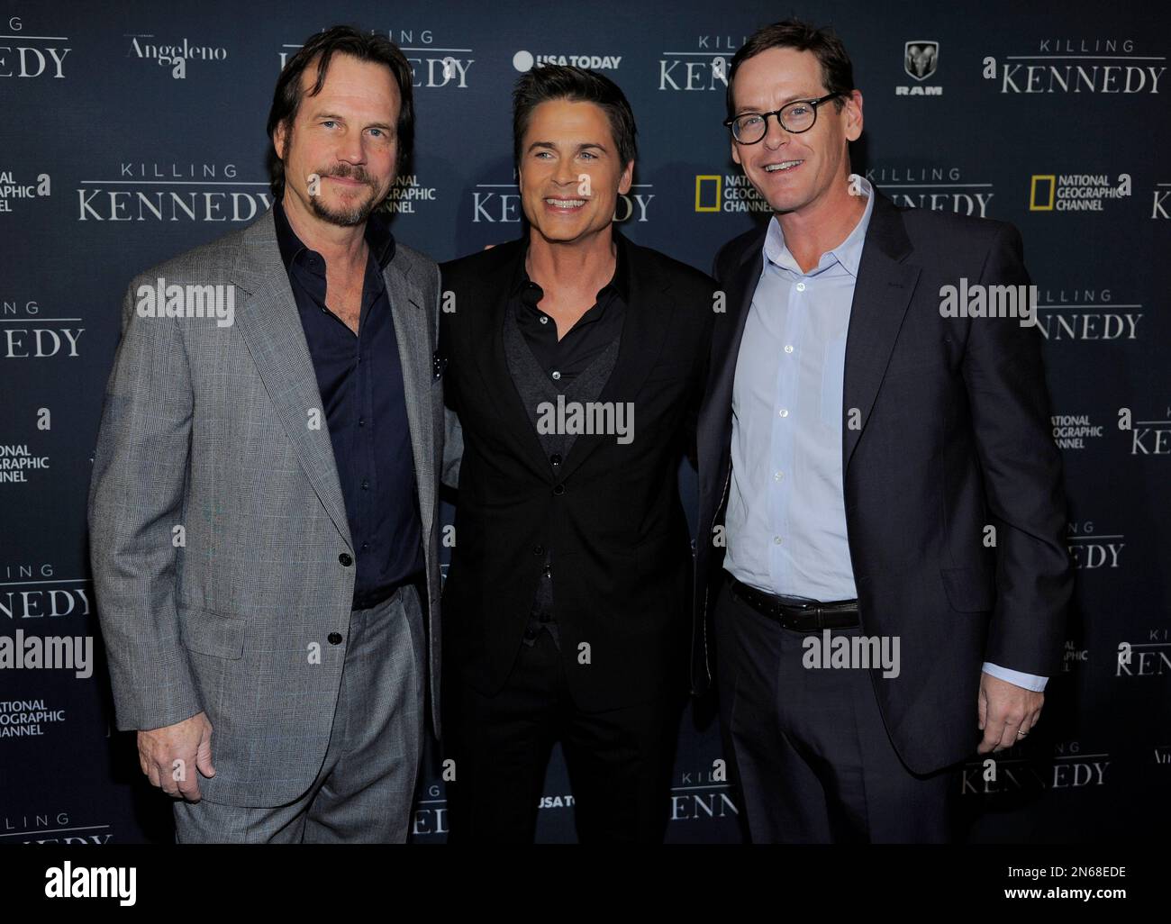 Rob Lowe, center, star of the film "Killing Kennedy," poses with actor ...