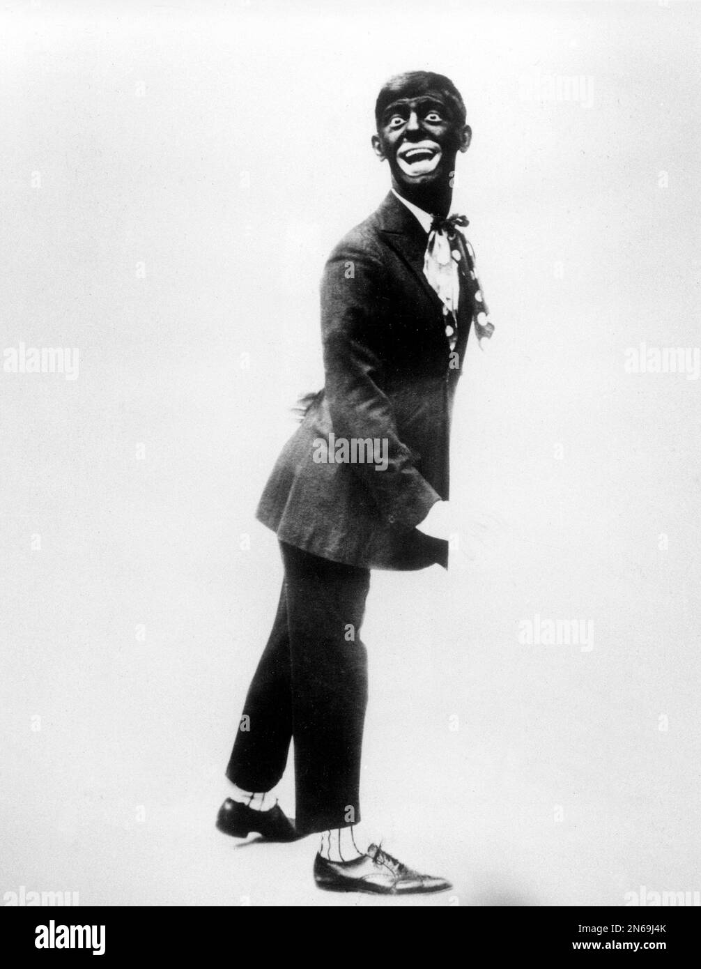This 1920s image shows comedian Eddie Cantor wearing blackface while ...